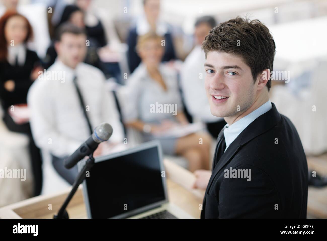 Young business man giving a presentation on conference Stock Photo - Alamy