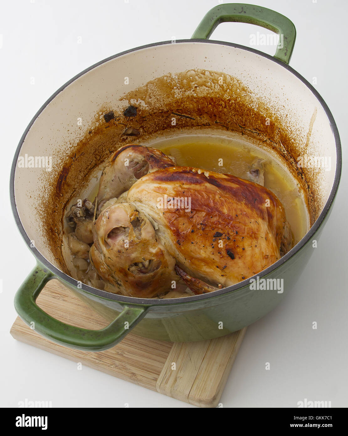 Roasted chiken in a pot Stock Photo - Alamy