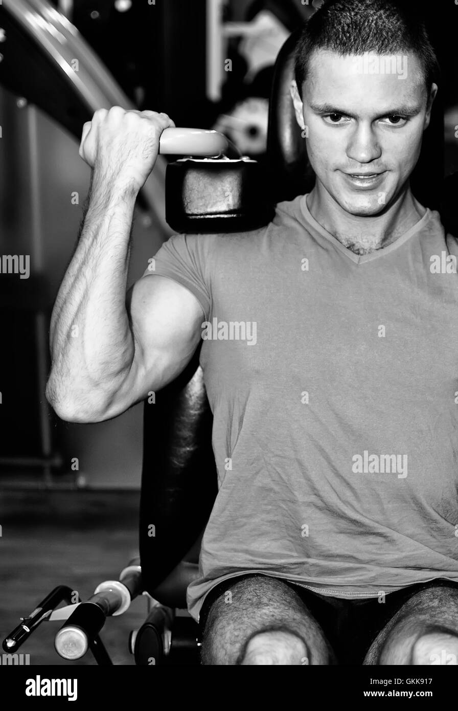 Fitness dumbbell man doing Black and White Stock Photos & Images - Alamy