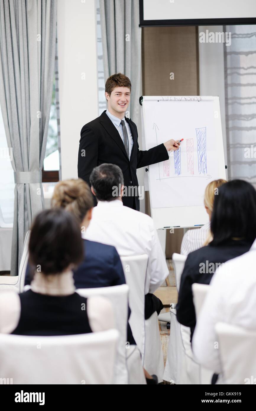 Young business man giving a presentation on conference Stock Photo - Alamy