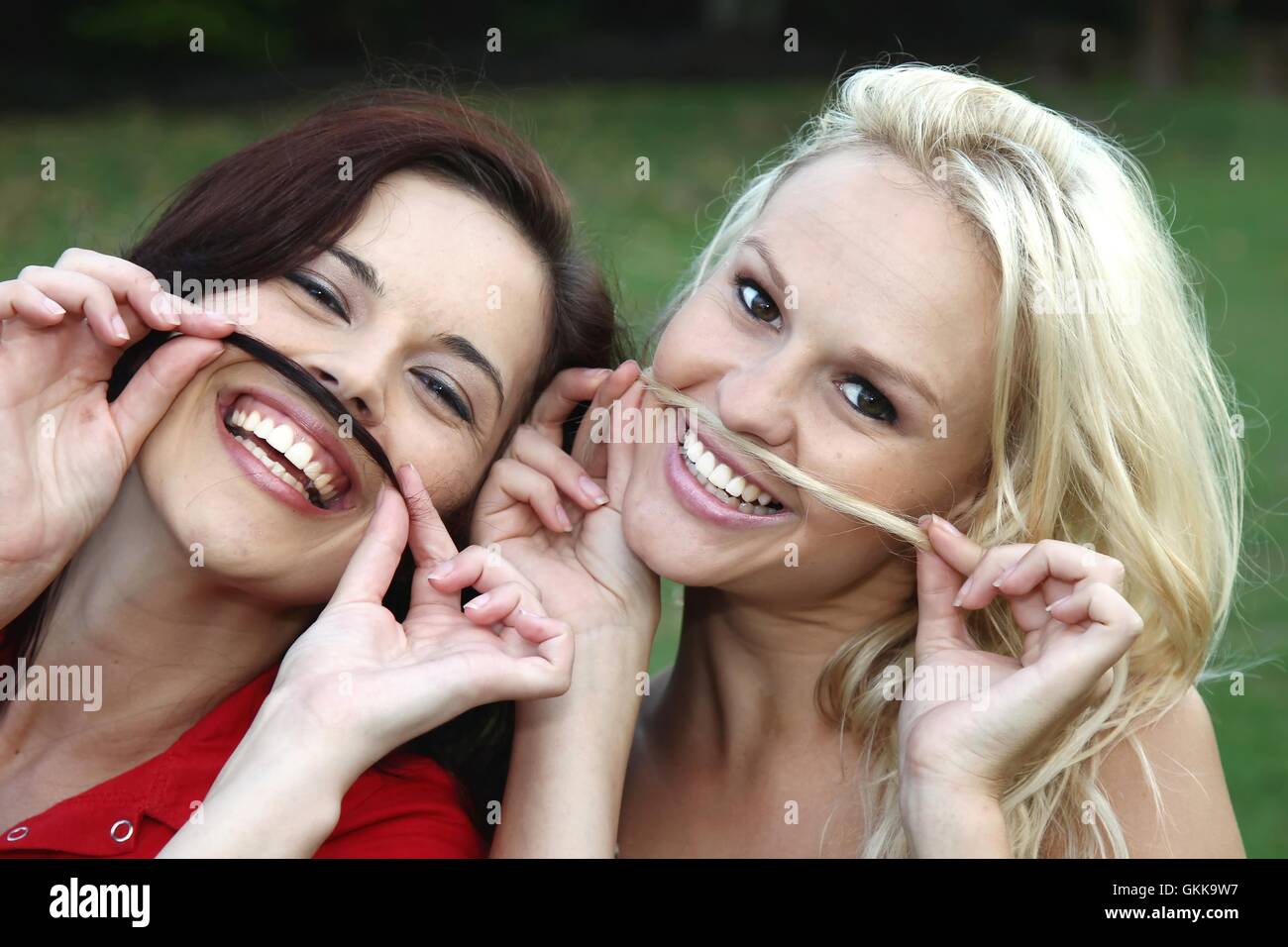 Friends Having Fun with Pretend Moustaches Stock Photo - Alamy