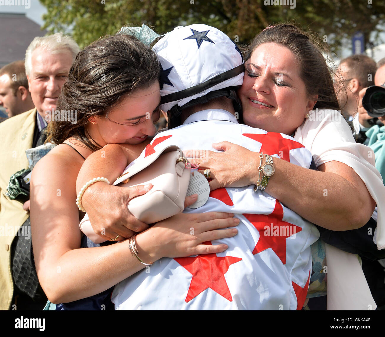 Jockey Adam McNamara is congratulated by friends after riding ...