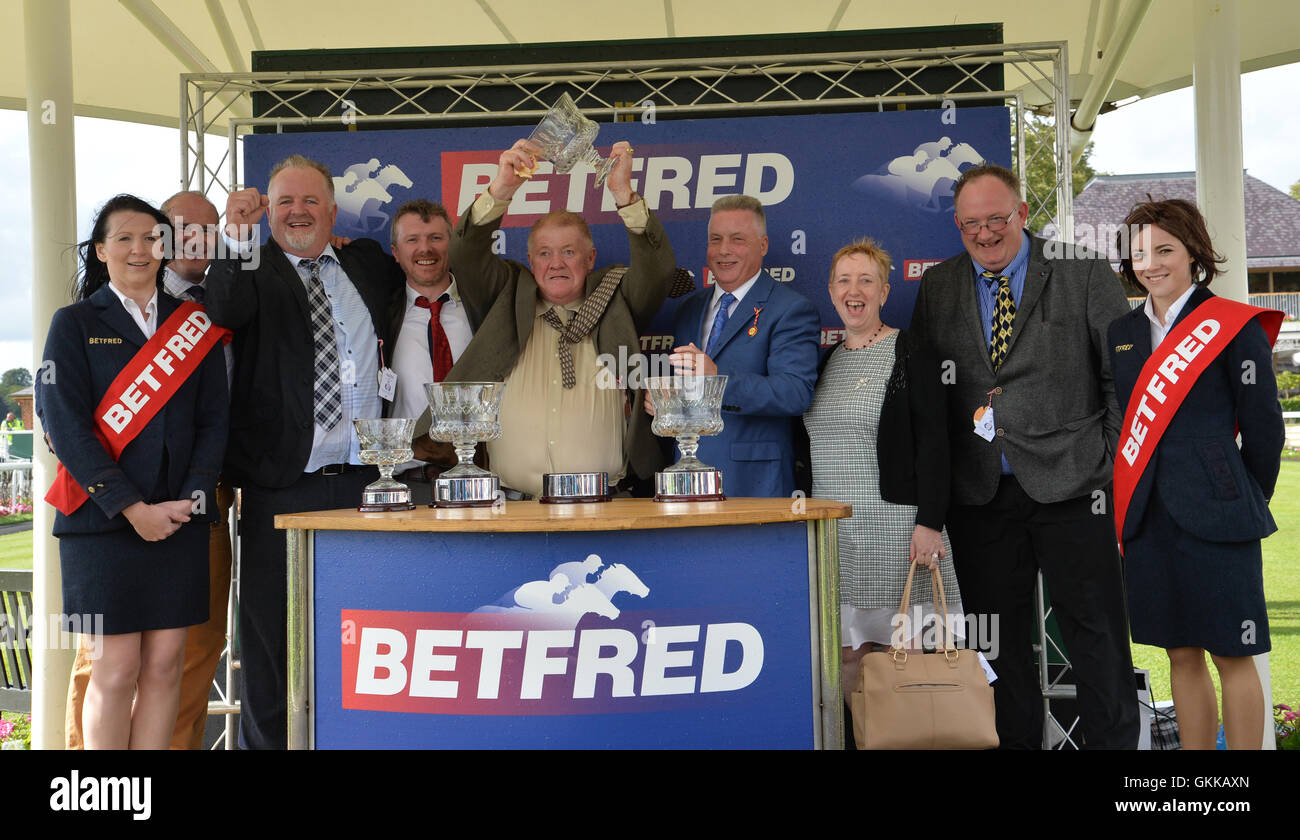 The winning connections of Heartbreak City celebrate after winning the ...