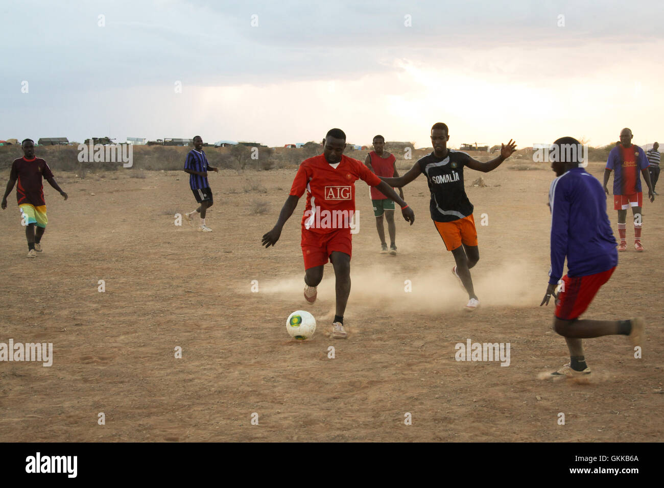 A group of AMISOM soldiers belonging to the Djiboutian contingent play ...