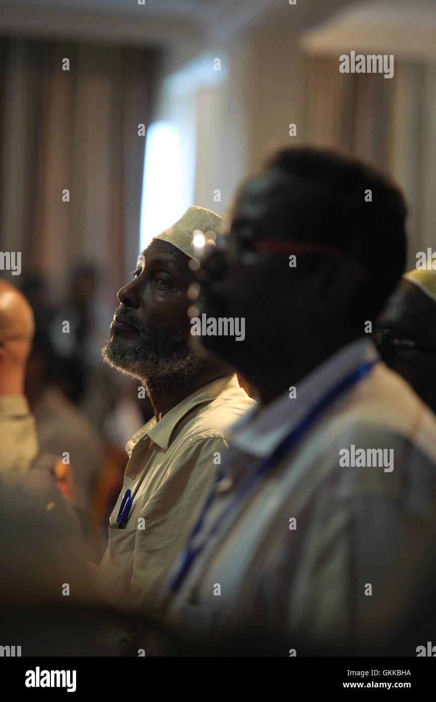Audience members listen to speakers at the Juba Reconciliation ...