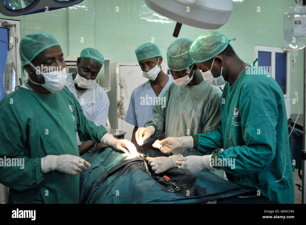 Surgeons at Banadir hospital in Mogadishu, Somalia, perform post ...