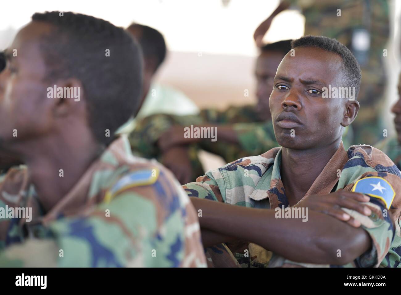 A Somali National Army graduate listens to Deputy Force Commander ...
