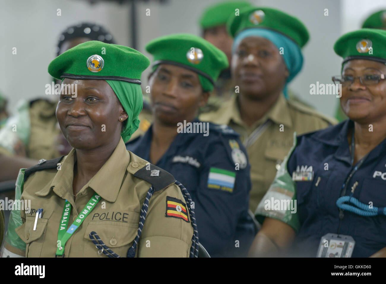 A Ugandan police officer listens to a speech by AMISOM Gender Officer ...