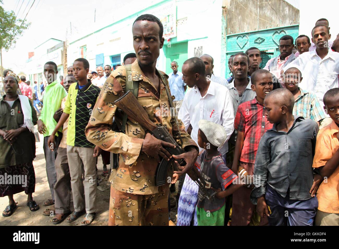 A member of the Somali National Army (SNA) walked alongside Ethiopian ...