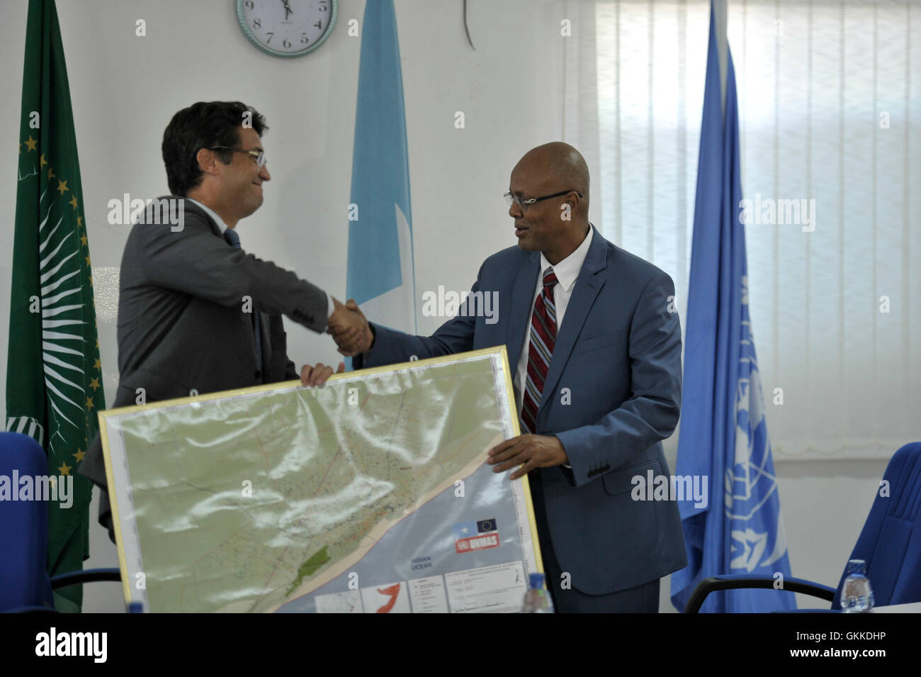 EU Special Envoy Michele Cervone d'Urso presents a map to Somali Prime ...
