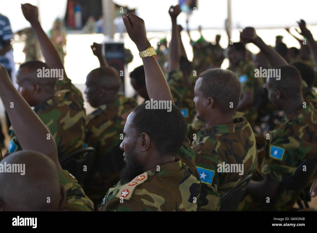 Graduates of the Somali National Army Platoon Commanders Training raise ...