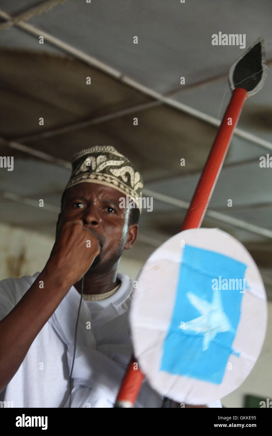 A traditional dancer performs to welcome the Special Representative of ...