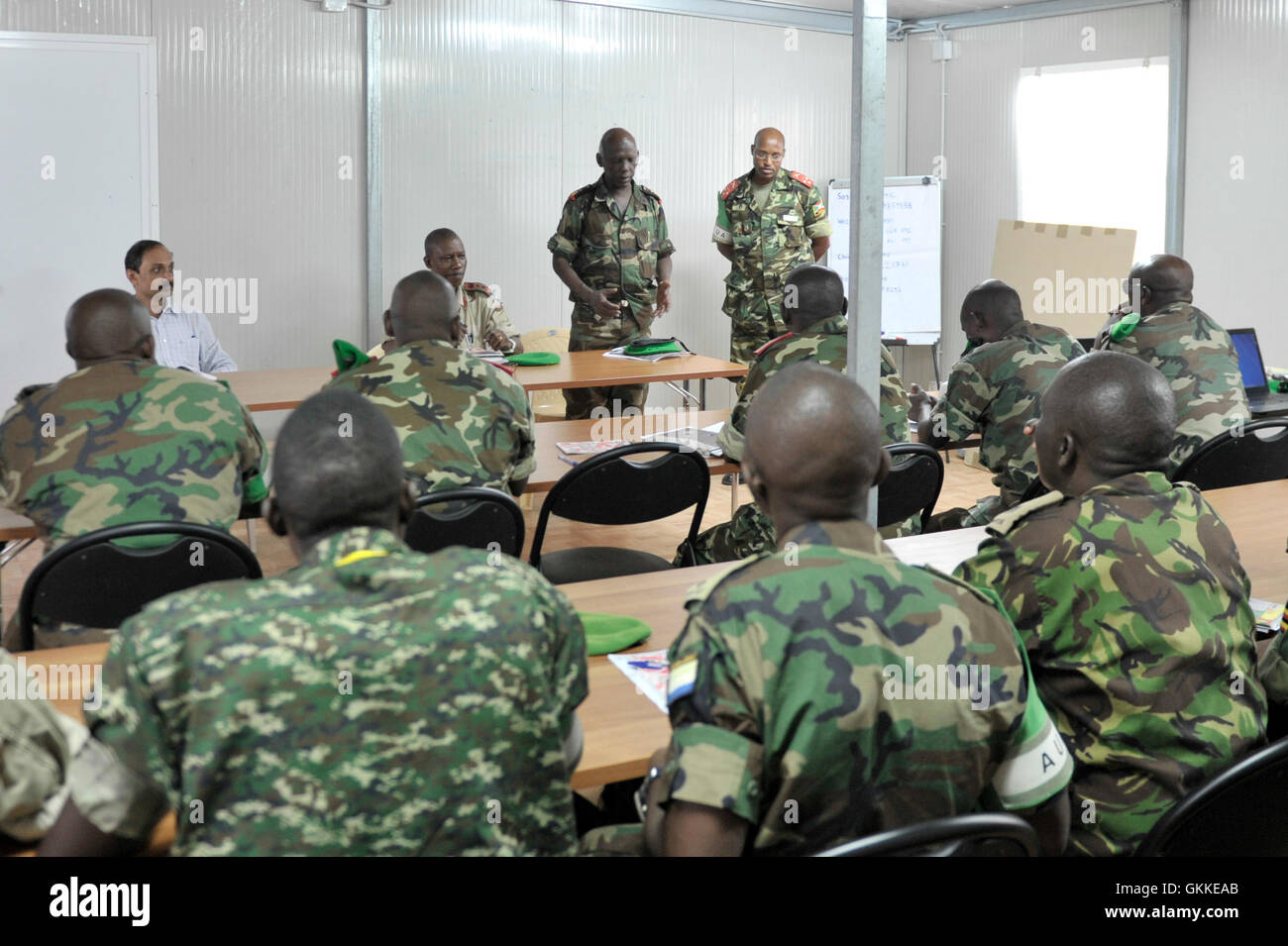 Lt. Col. Ali Hamid, Chief of CIMIC, delivers the opening speech at the ...
