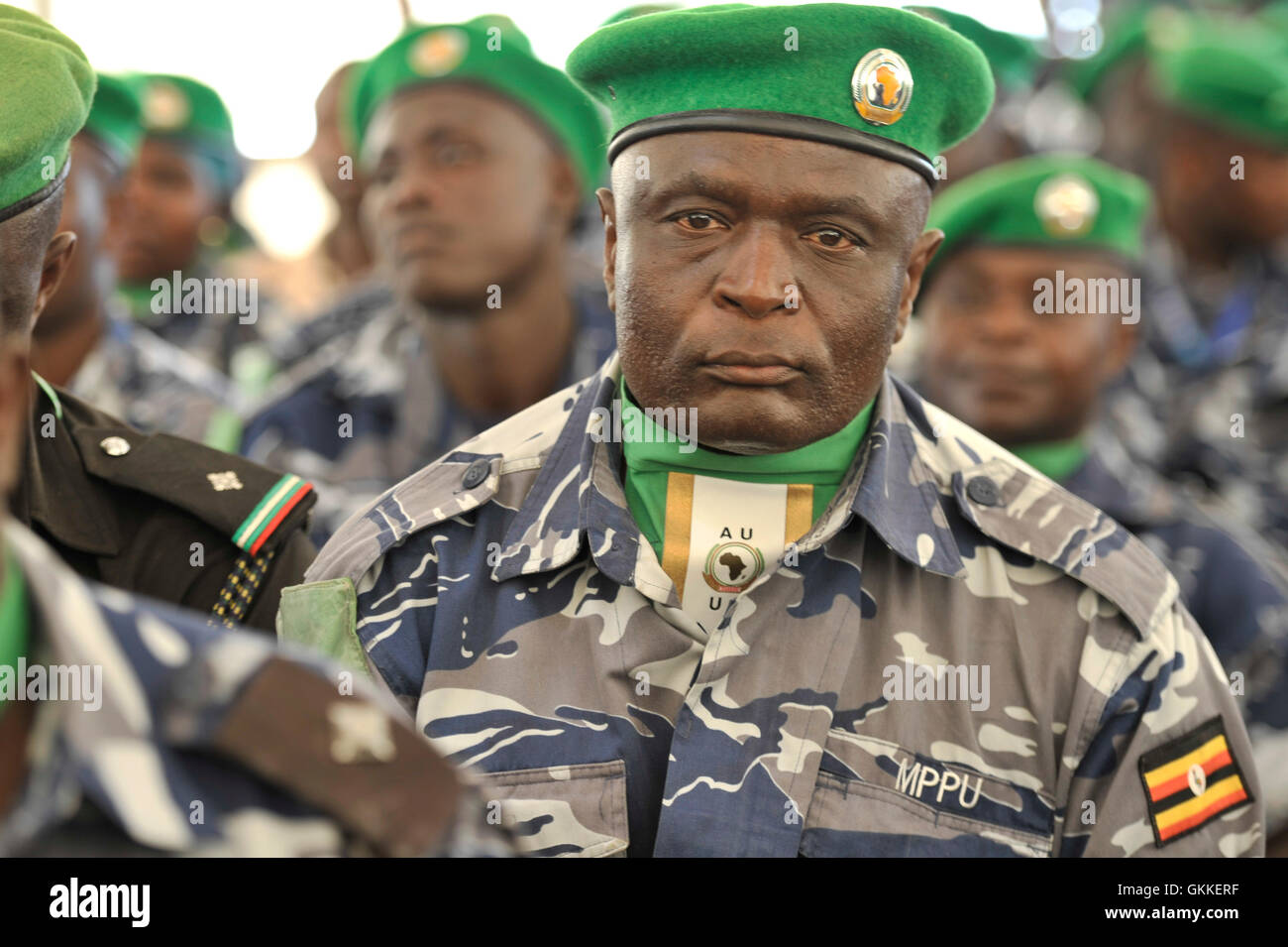 A Ugandan police officer observes the proceedings during a medal award ...