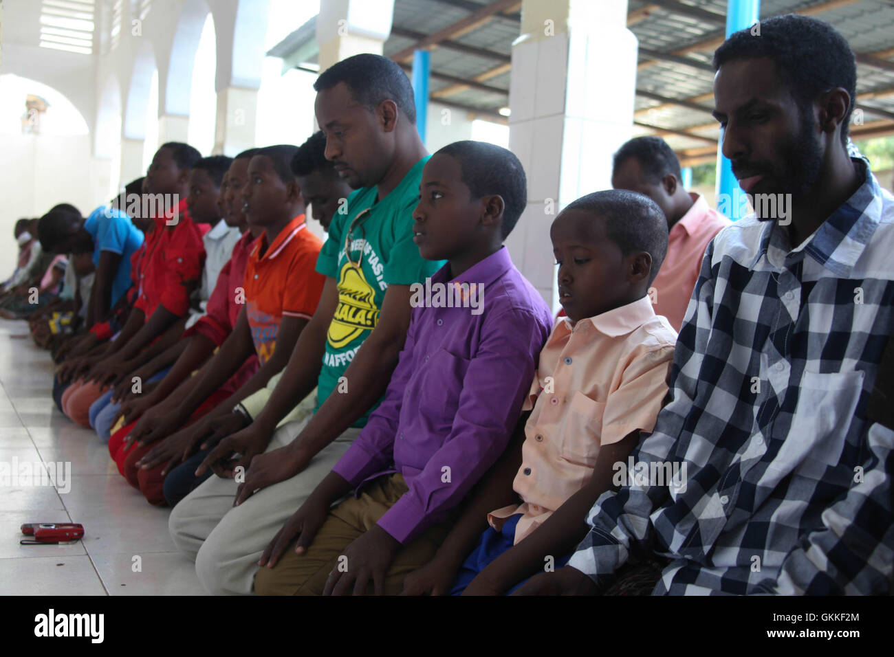 People gather to pray during Eid al-Fitr at Beletweyn's central mosque ...