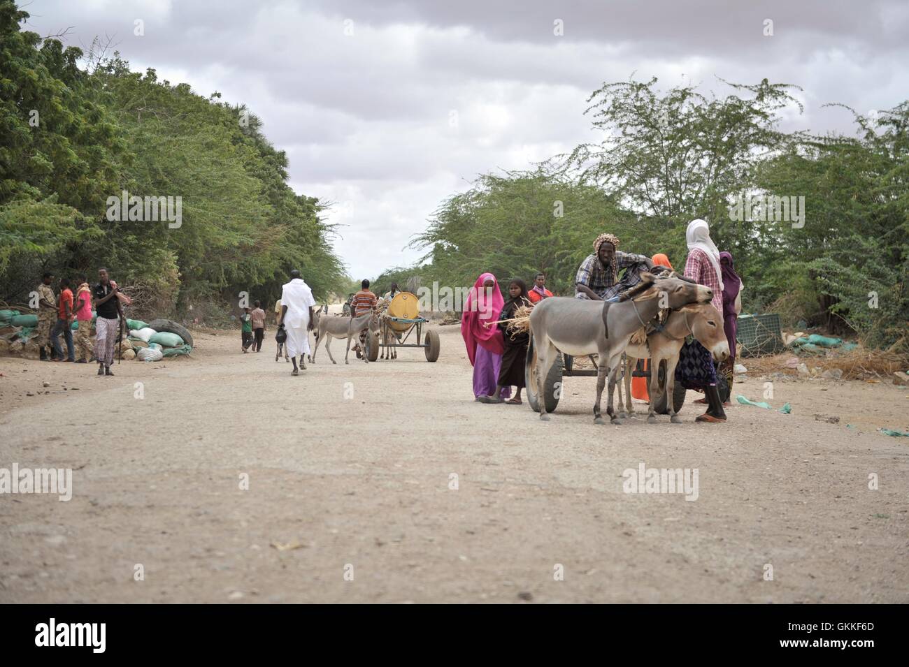 A man sits next to a water point in Bulo Burte, Somalia, on August 12 ...
