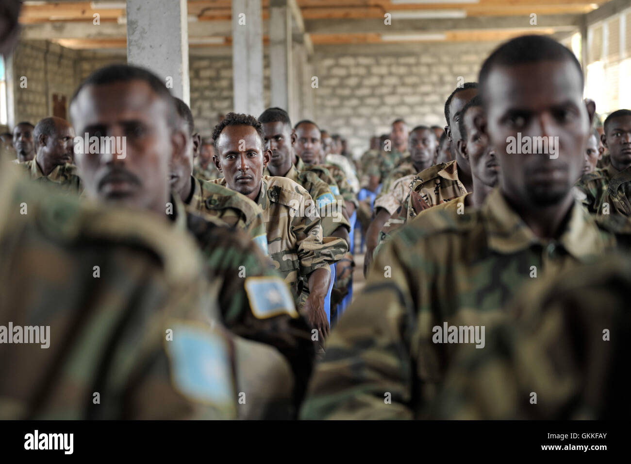 Somali National Army soldiers listen at their graduation ceremony after ...