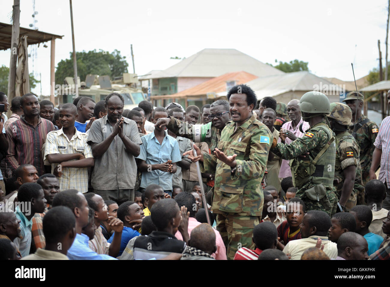 AMISOM's contingent commander, Brig. General Dick Olum, and the ...