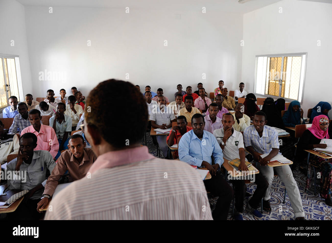 Somali lecturer gives lesson to his students in the class at the Somali ...