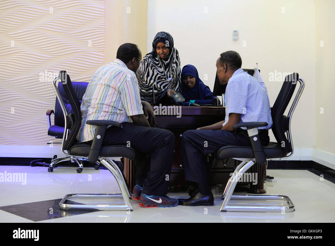 In downtown Mogadishu, two bank employees at the International Bank of ...
