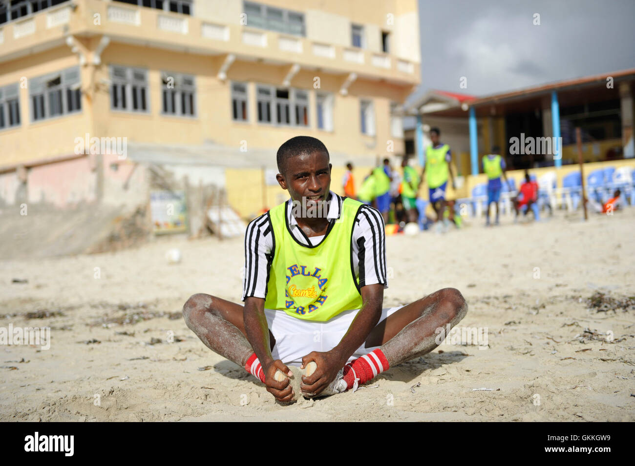 A player with Heegan FC takes a break during a training session at Lido ...