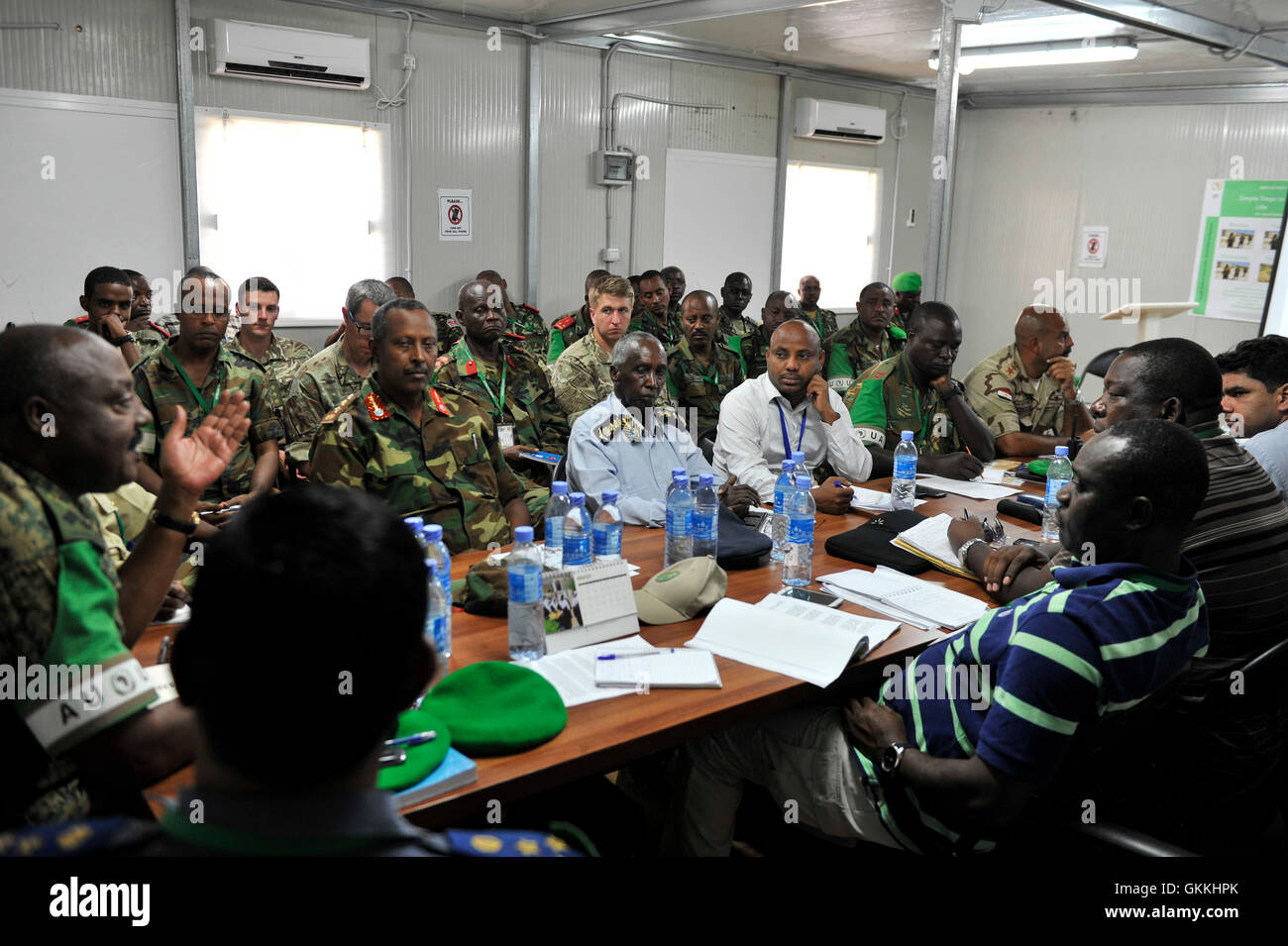Senior AMISOM and Somali military officials attend a meeting in ...