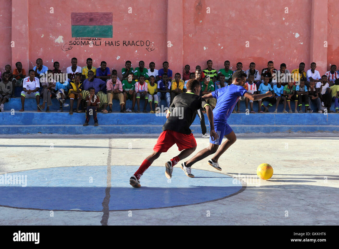 Two young Somali football players compete for the ball during a match ...