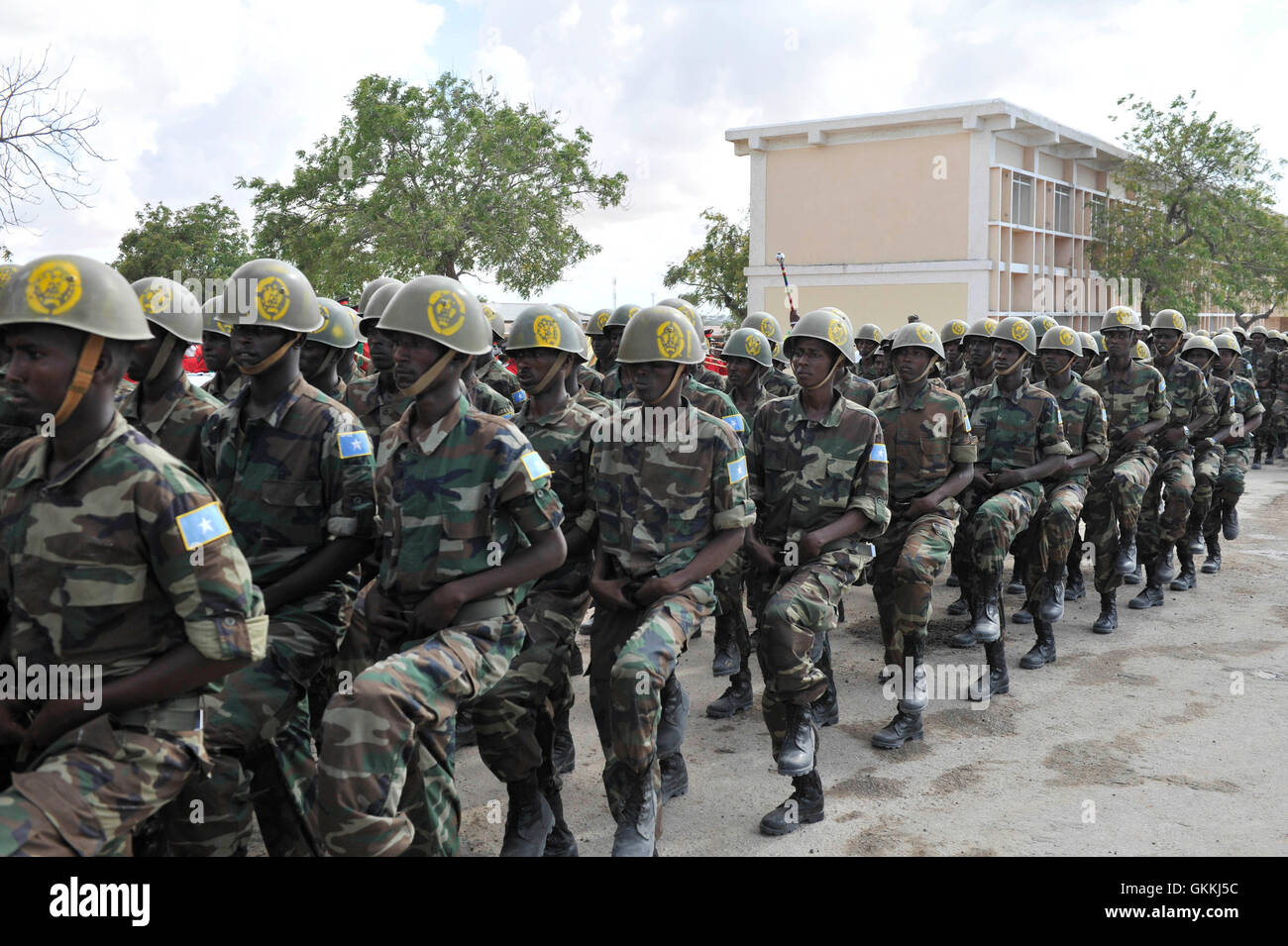 Somali National Army soldiers march during the 55th Anniversary ...