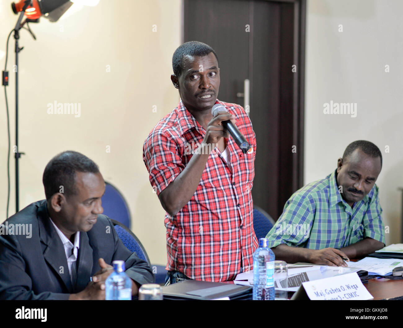 A participant speaking during the AMISOM CIMIC Review meeting in ...