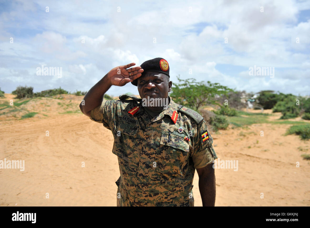 General Katumba Wamala, Uganda's Chief of Defence Forces, salutes ...
