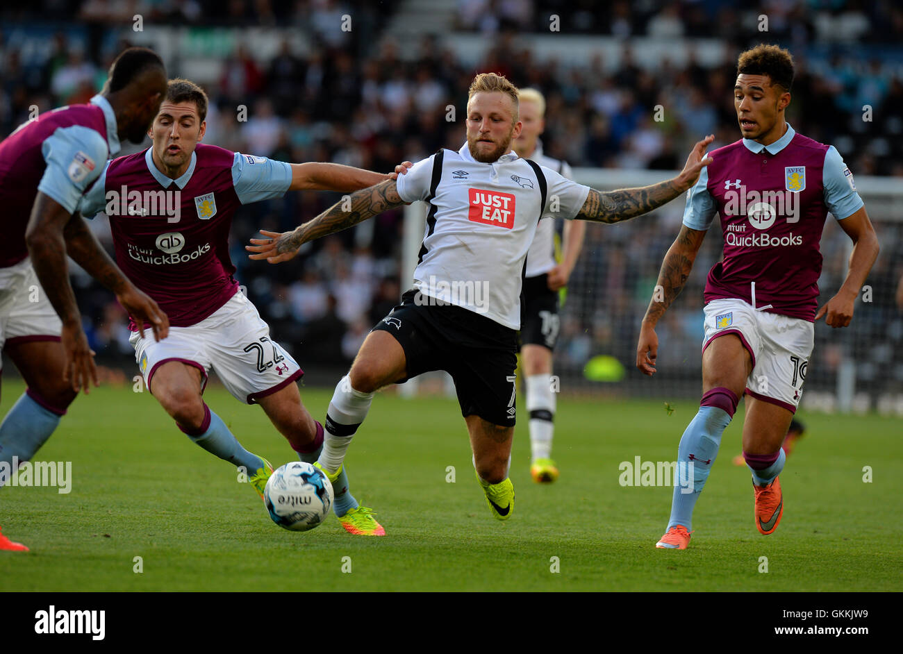 Derby County's Johnny Russell bursts through the Aston Villa defence ...