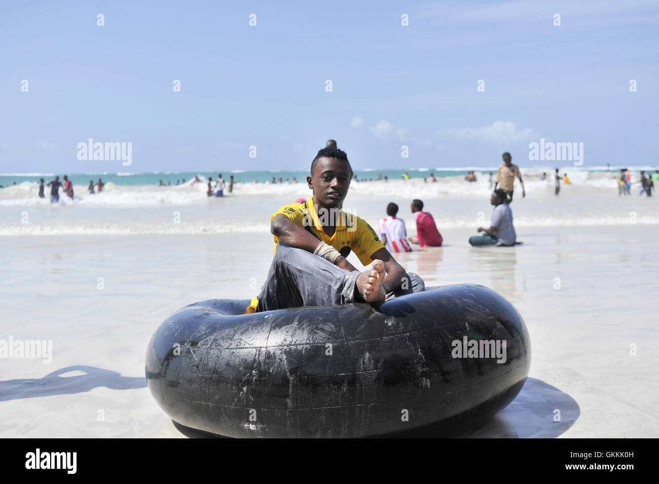 On June 12, 2015, a young man enjoys a day at Lido Beach in Mogadishu ...