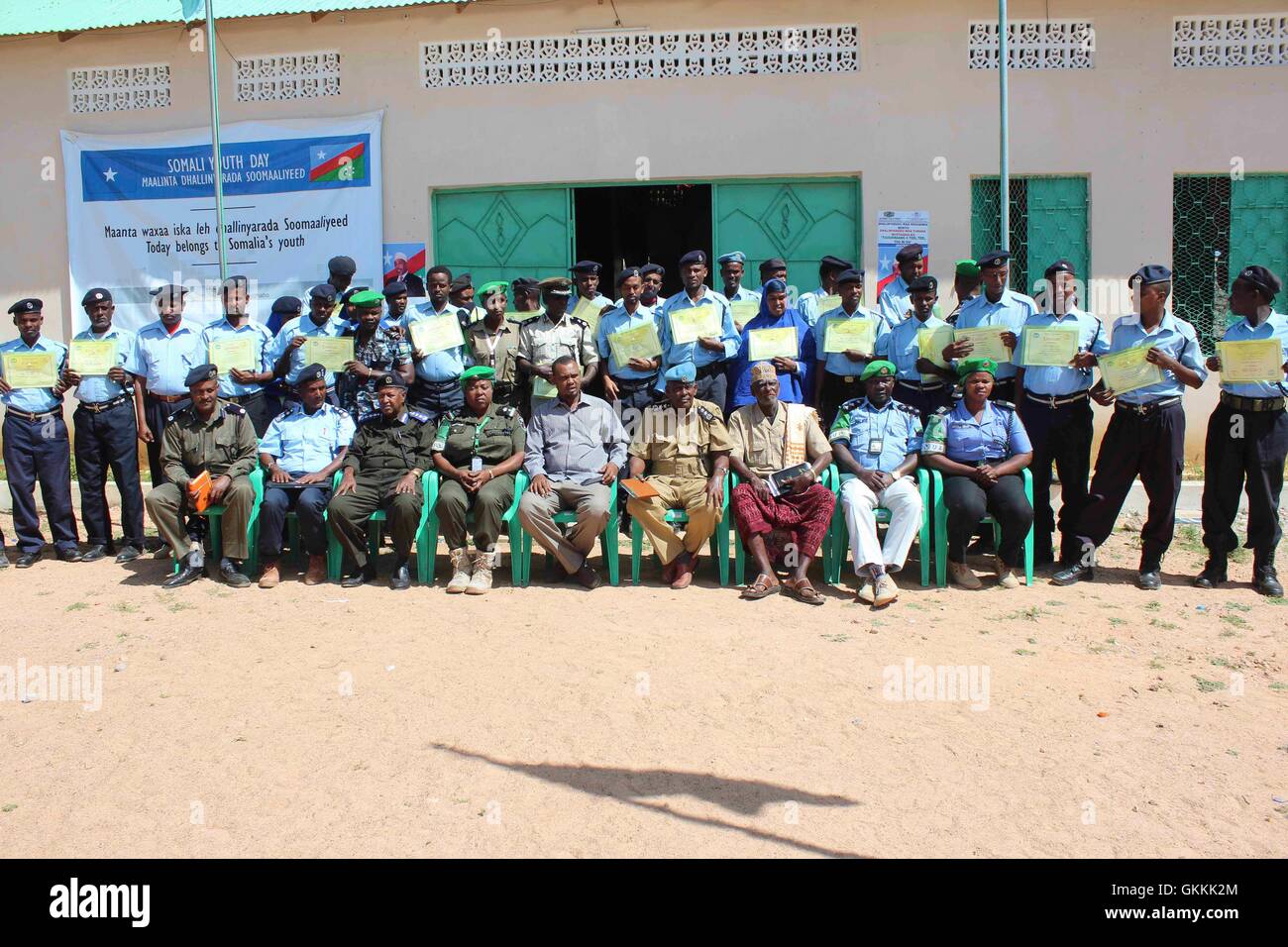 Officers from the Somali Police Force and AMISOM Police component pose ...