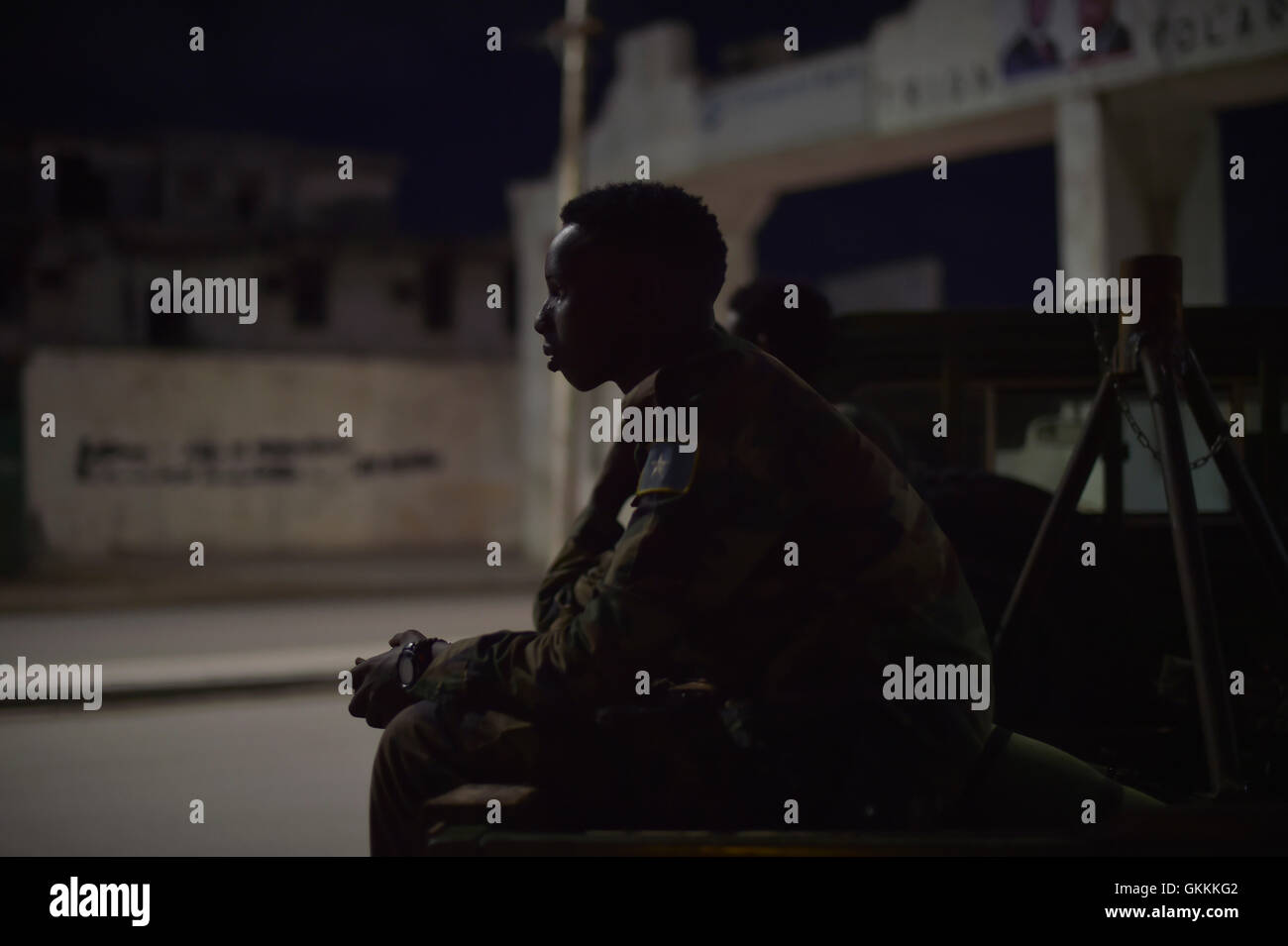 A member of the Somali National Army stands guard at the K4 roundabout ...
