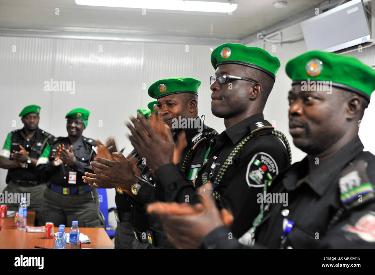 Nineteen newly deployed Nigerian police officers attend the closing ...