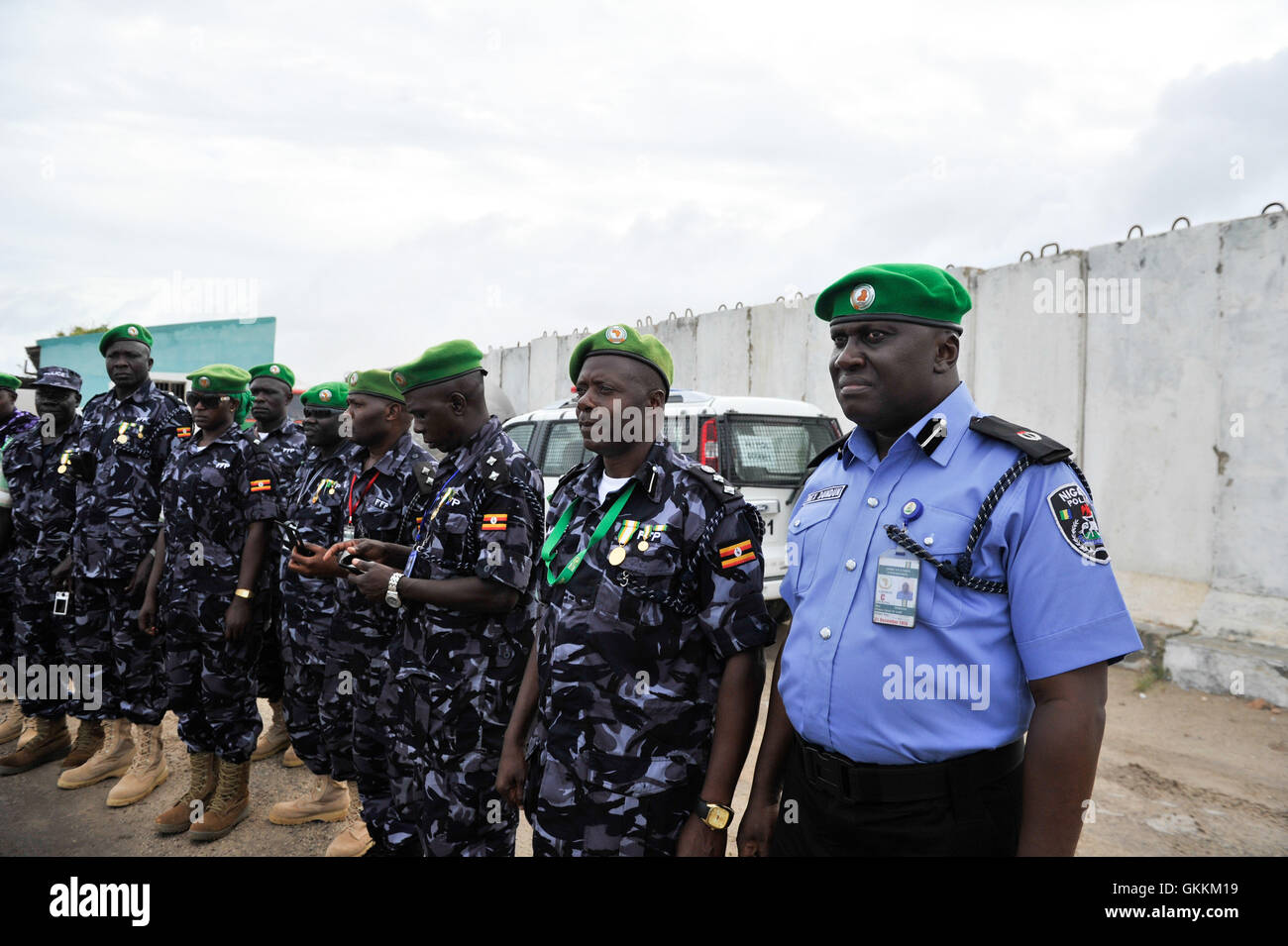 AMISOM Police Chief of Staff, ACP Rex Dundun and the outgoing ...
