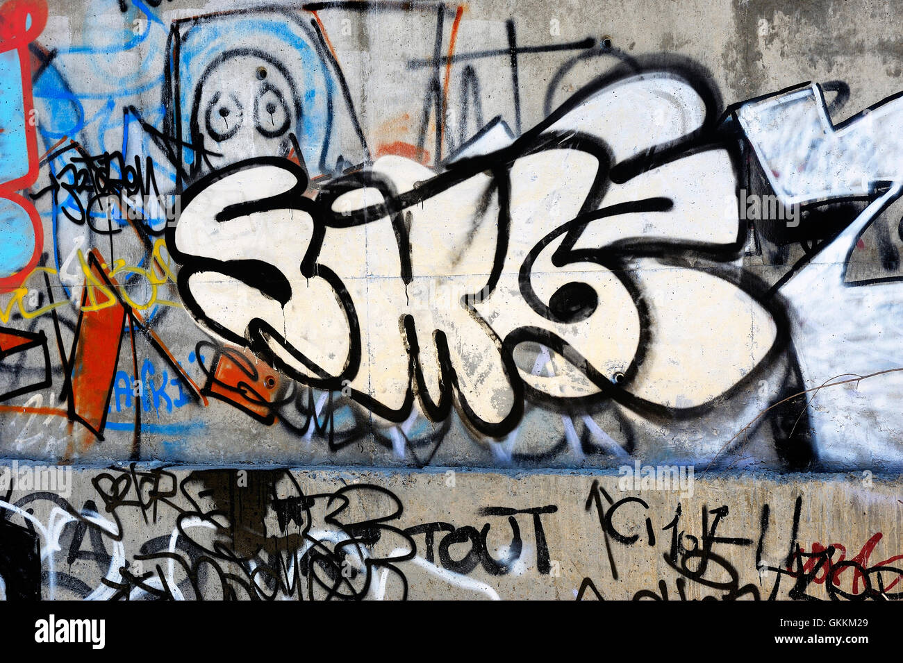 Tags on a cement wall Stock Photo - Alamy