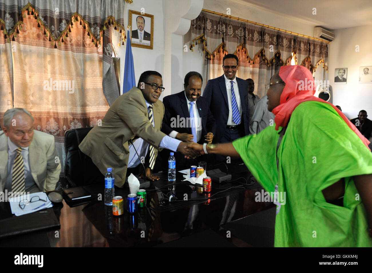 On August 8, 2015, Lydia Wanyoto, DSRCC for Somalia, shook hands with ...