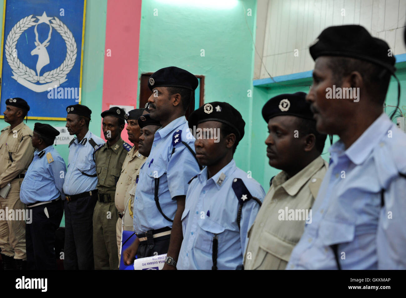 Newly trained Somali police officers attend the closing ceremony of a ...