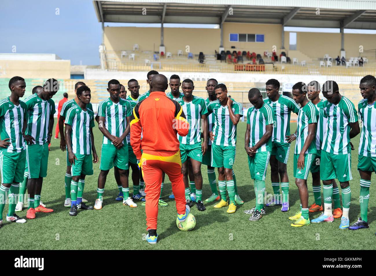 Coach Livingstone Mbabazi of the Somalia national soccer team speaks to ...