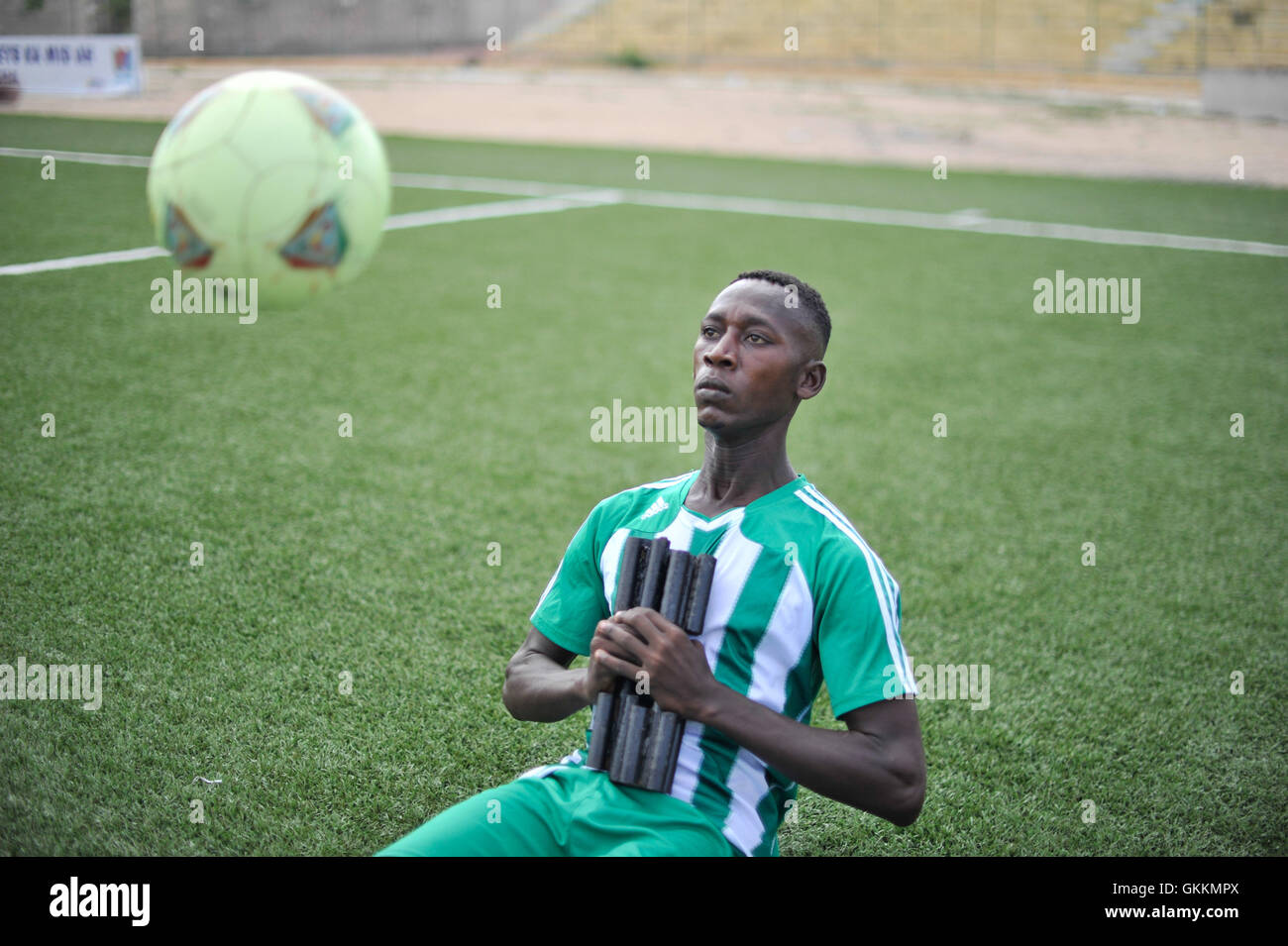 A Somali national soccer player trains at Banadir Stadium in Mogadishu ...