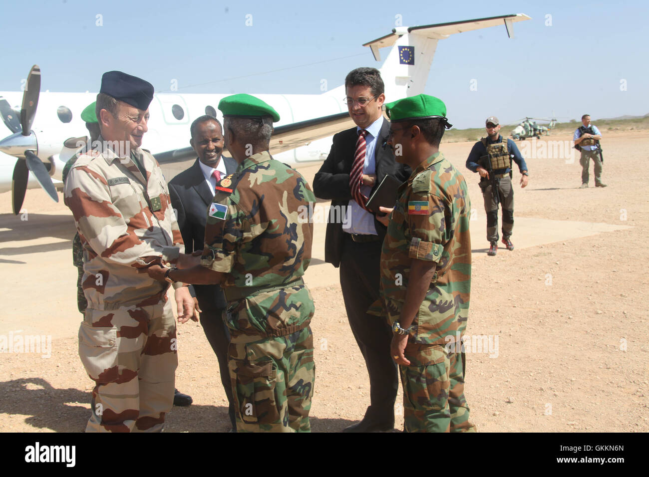 AMISOM Sector IV Commander Col. Abdourahman Dhembil (right) meets ...