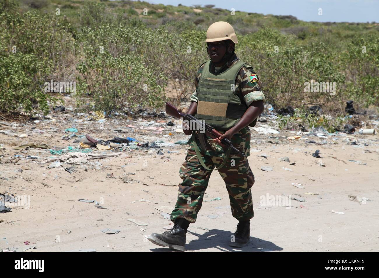 A Burundian soldier serving with AMISOM patrols the outskirts of ...