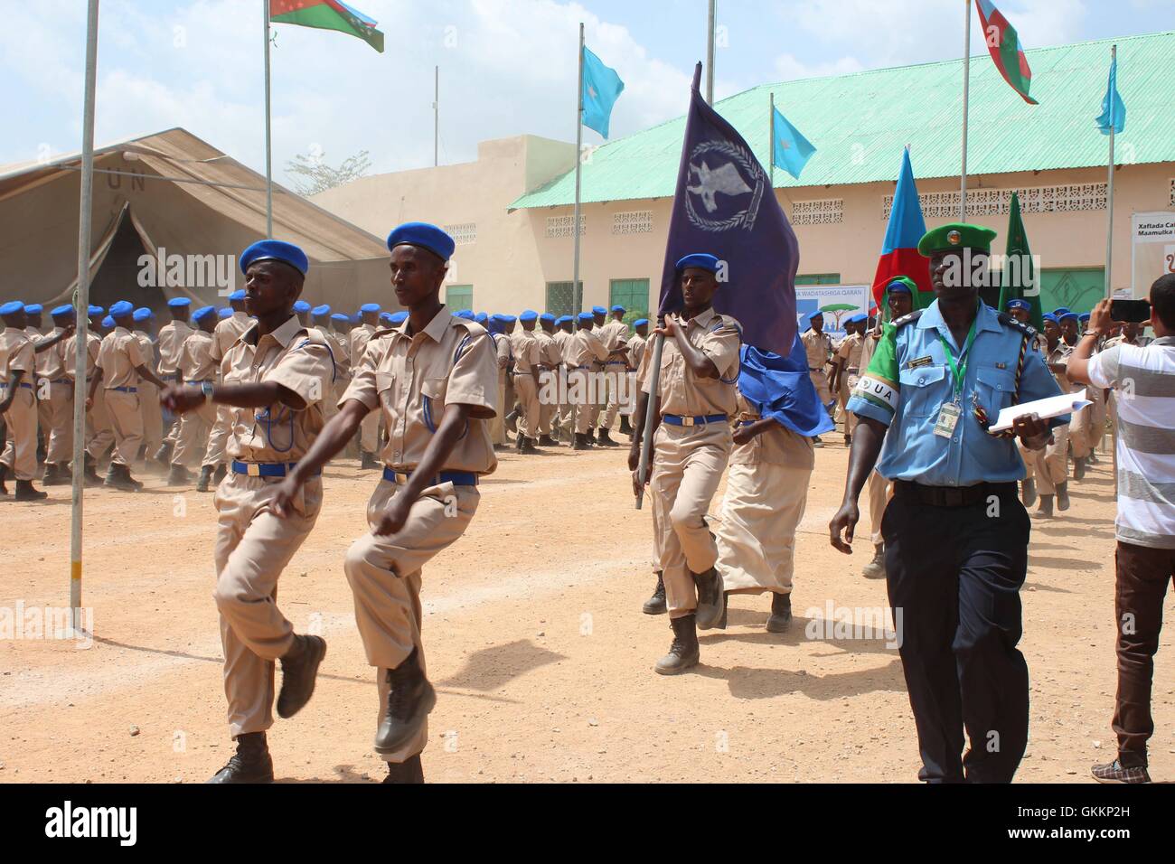 Newly trained Somali Police officers take part in a pass-out ceremony ...