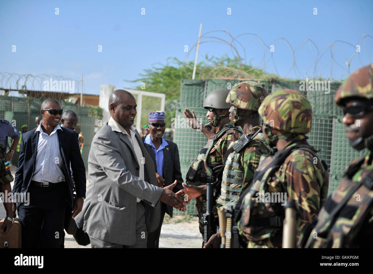 AMISOM Force Commander Lt. General Jonathan Rono shakes hands with ...