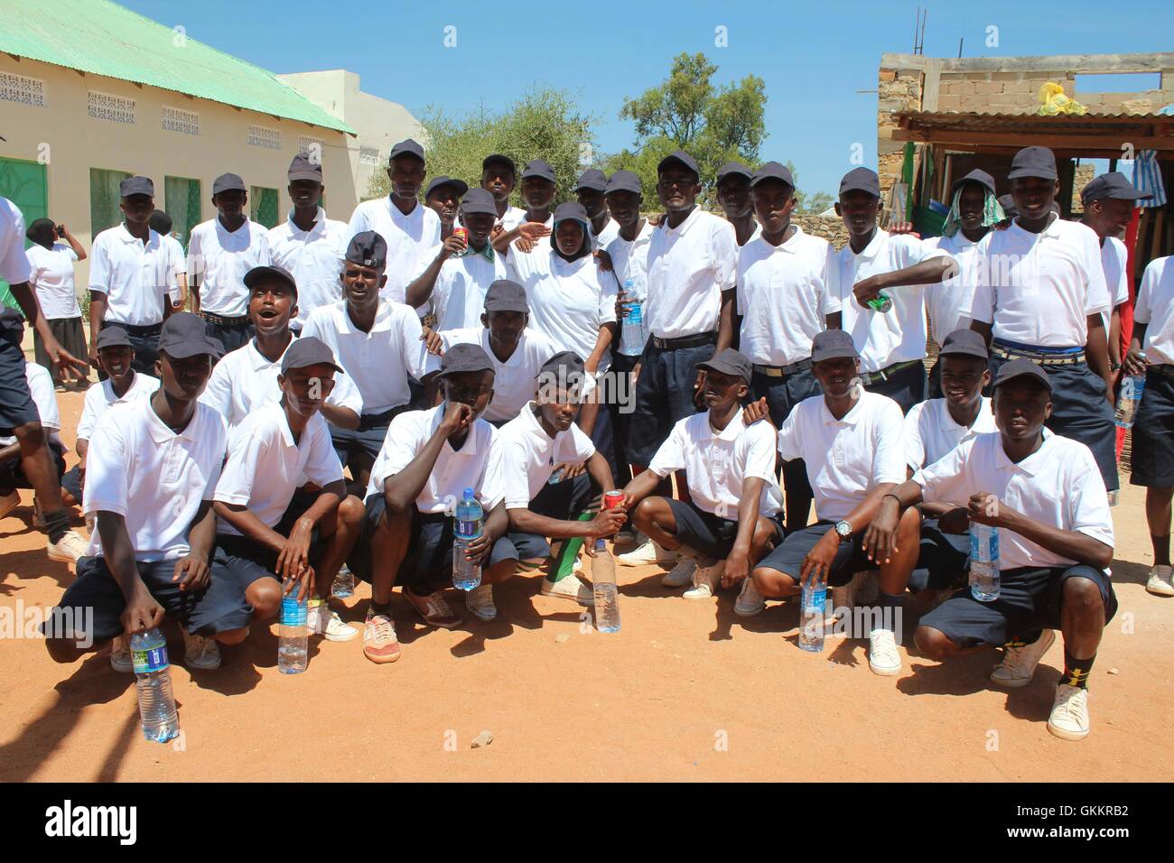 Recruits pose for a photo during an opening ceremony for training of at ...