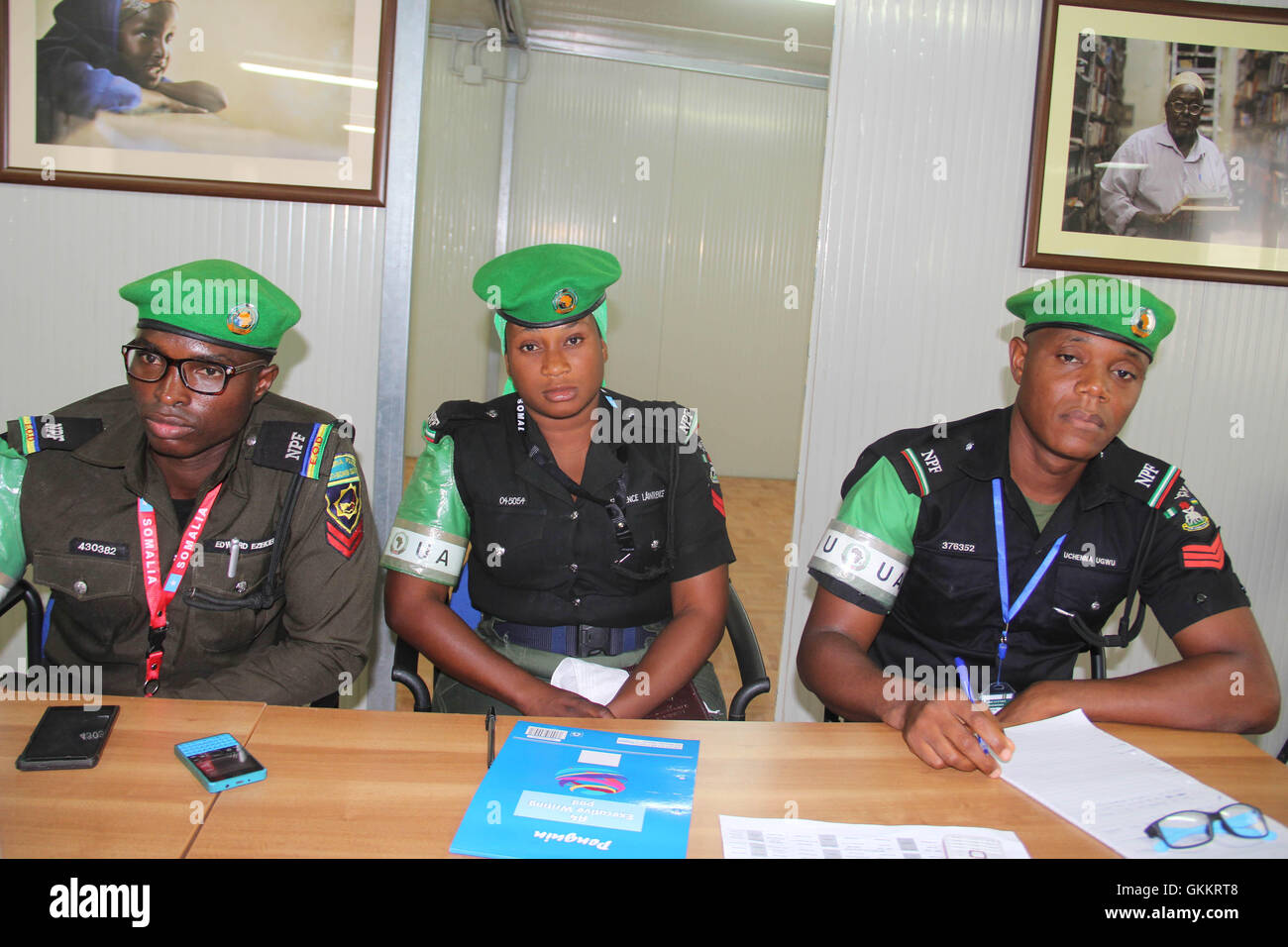 African Union Mission in Somalia (AMISOM) police officers attend an in ...