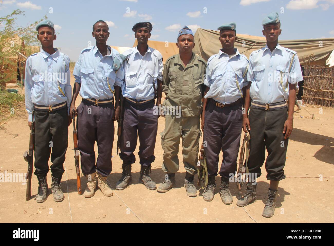 Newly deployed Somali police officers pose for a photograph after a ...