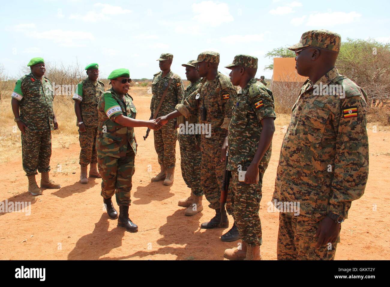 AMISOM Acting Force Commander Maj. Gen. Mohammedesha Zeyinu greets a ...