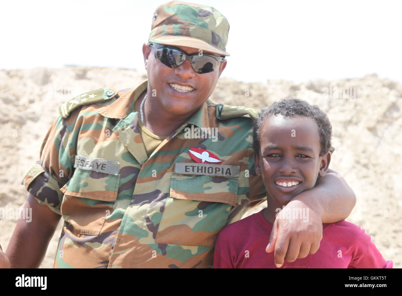 AMISOM ENDF Commander, Colonel Regassa Tesfaye, meets a young boy in ...